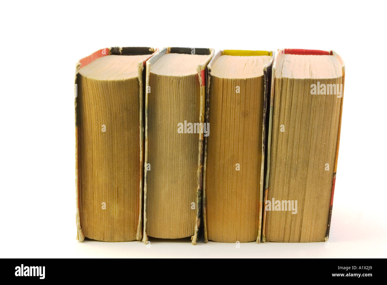 Four Little Big Books in a row Stock Photo - Alamy