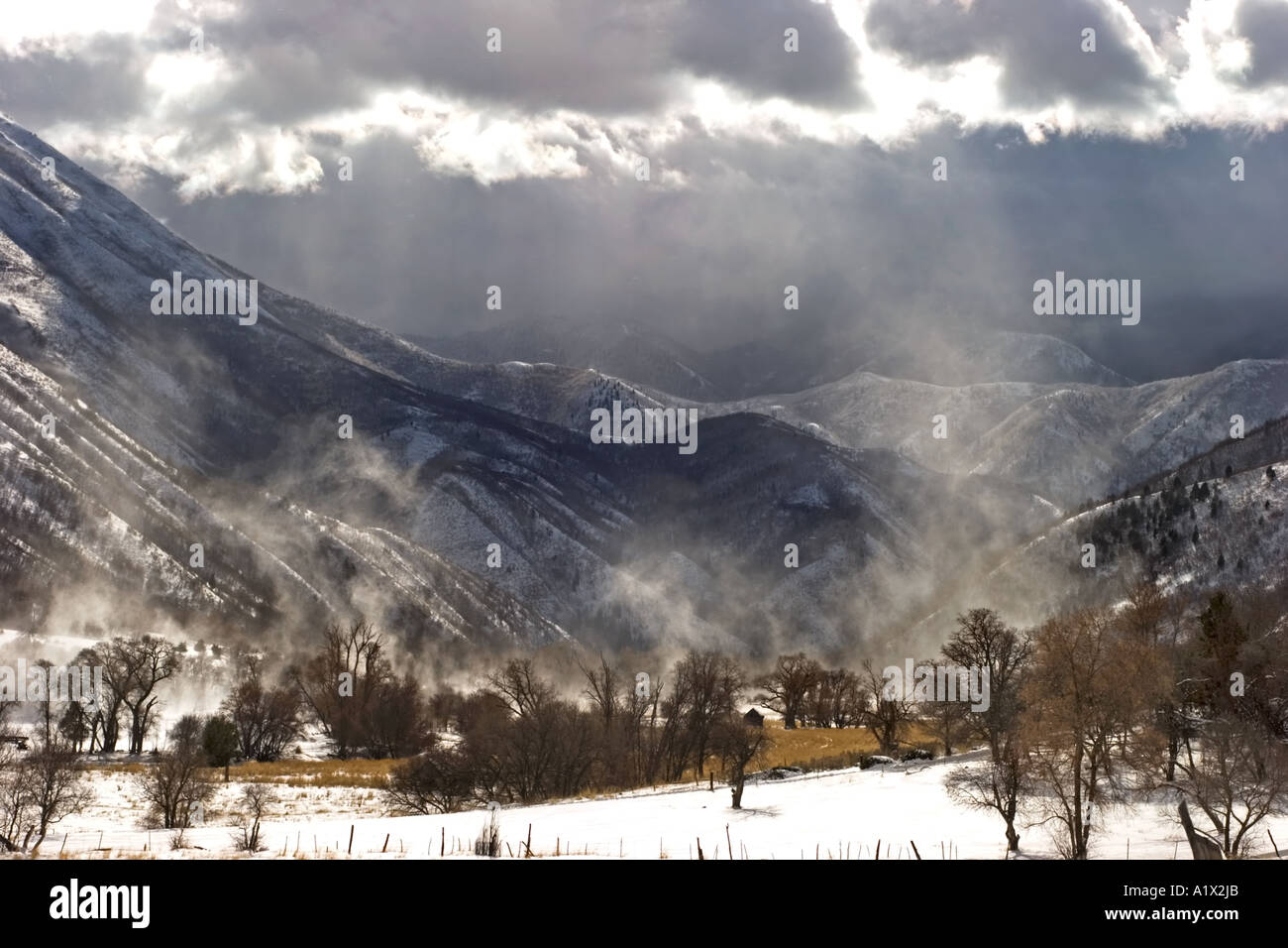Mountain valley snow storm farms and fields Stock Photo - Alamy