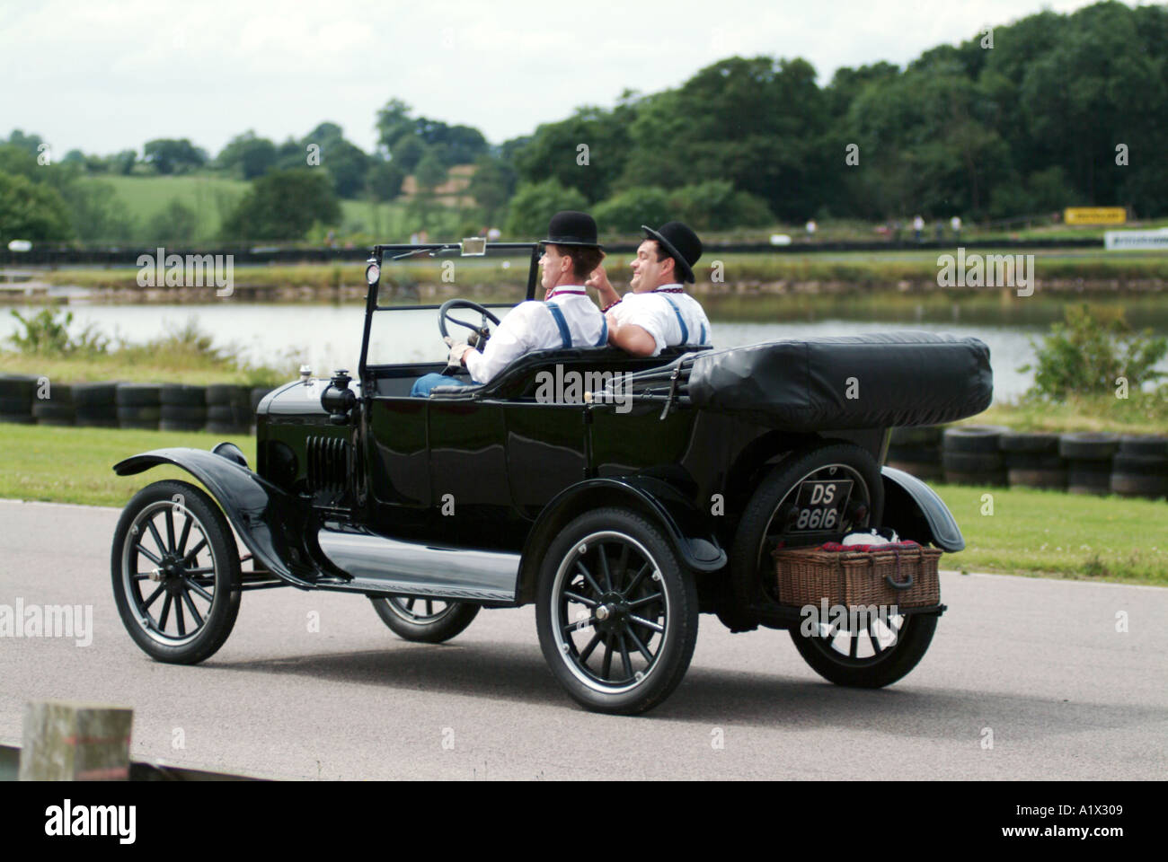 laurel and hardy look alike driving a classic ford car comedy duo actor ...