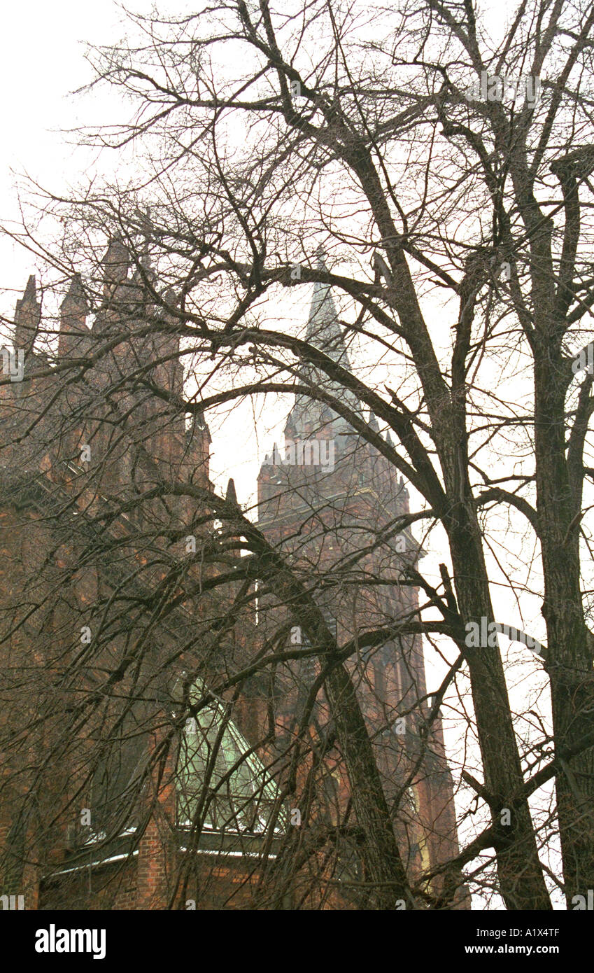 Catholic church viewed through the trees. Lodz Poland Stock Photo - Alamy