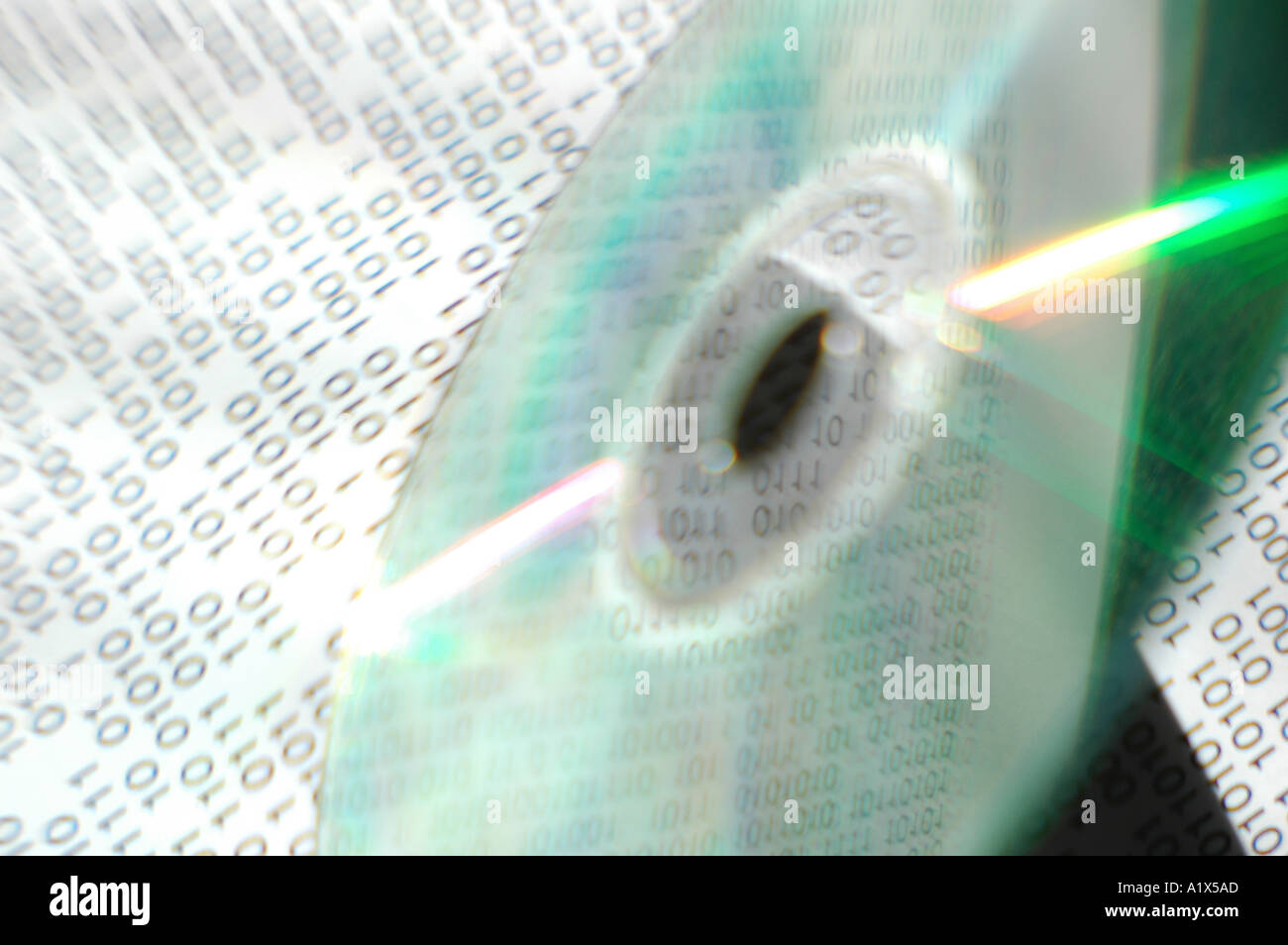 Binary code and cd rom disc computer with saturated color shadows Stock ...