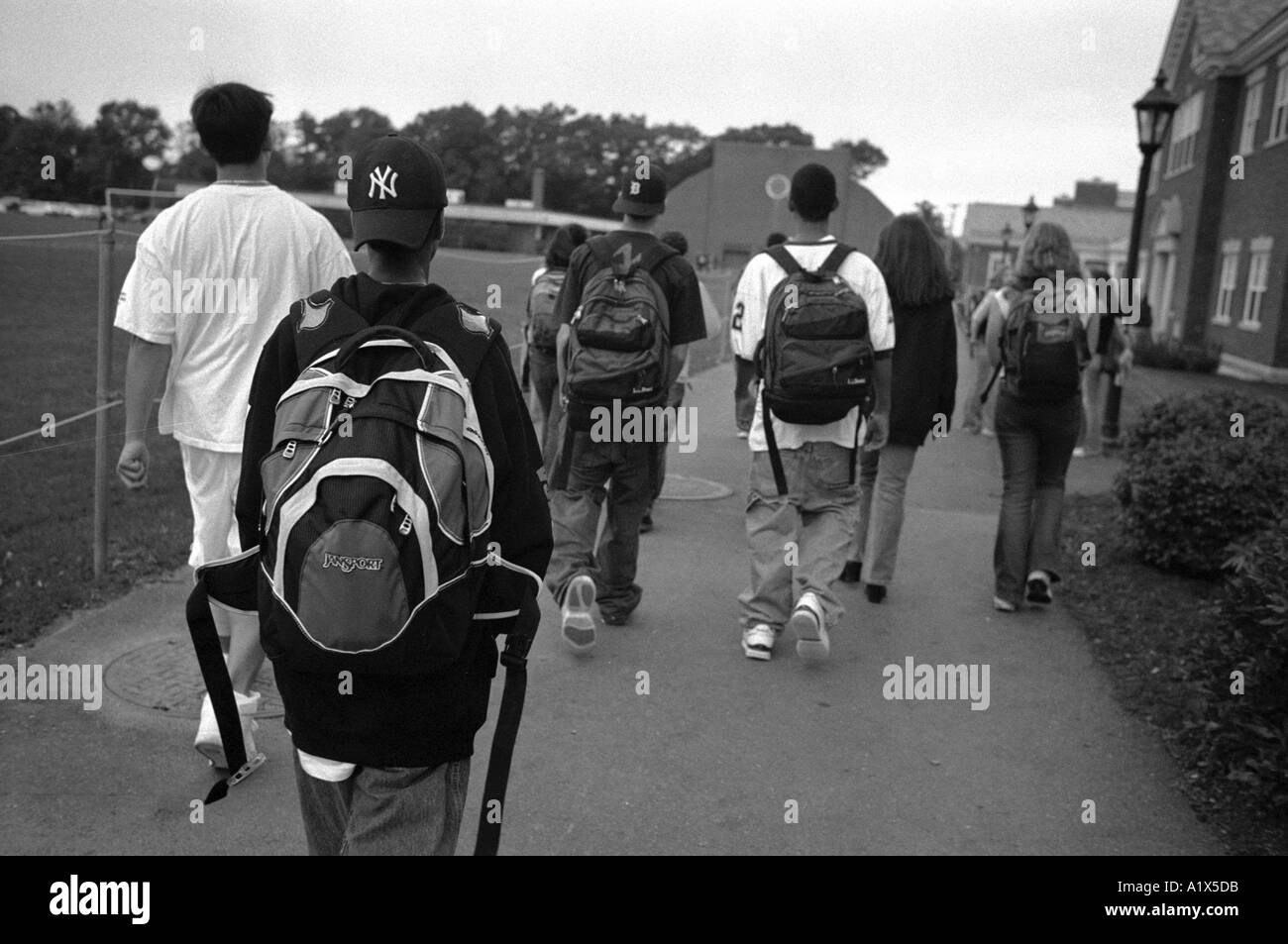 American USA US students trend wearing backpacks going to school Stock ...