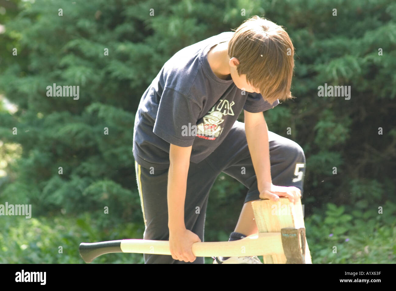 Boy Chopping Wood