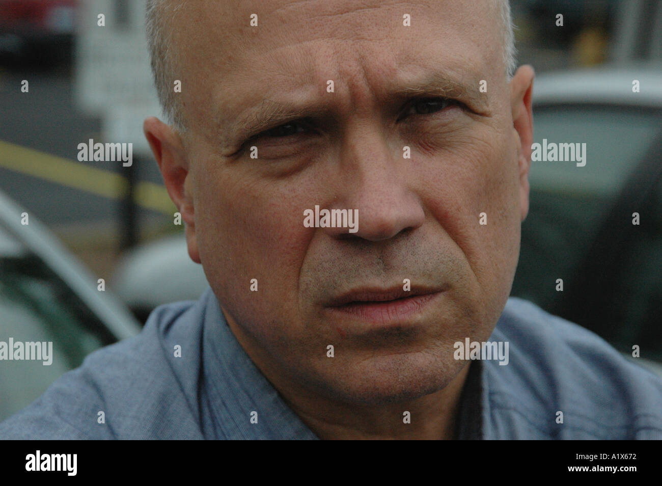 stern looking serious face man looking at camera Stock Photo - Alamy