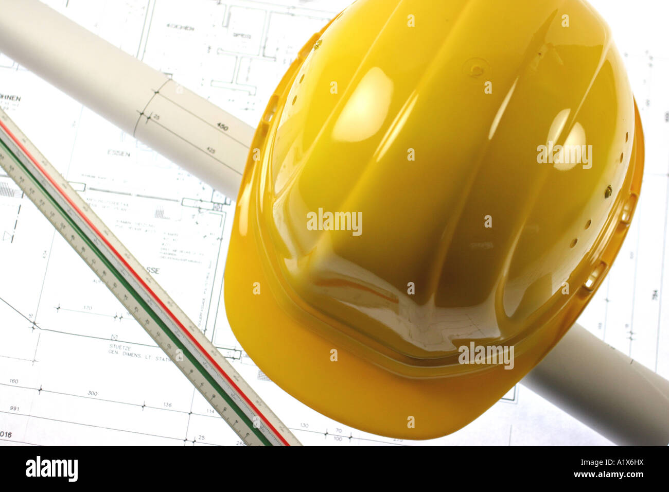 construction plan and a helmet Stock Photo - Alamy