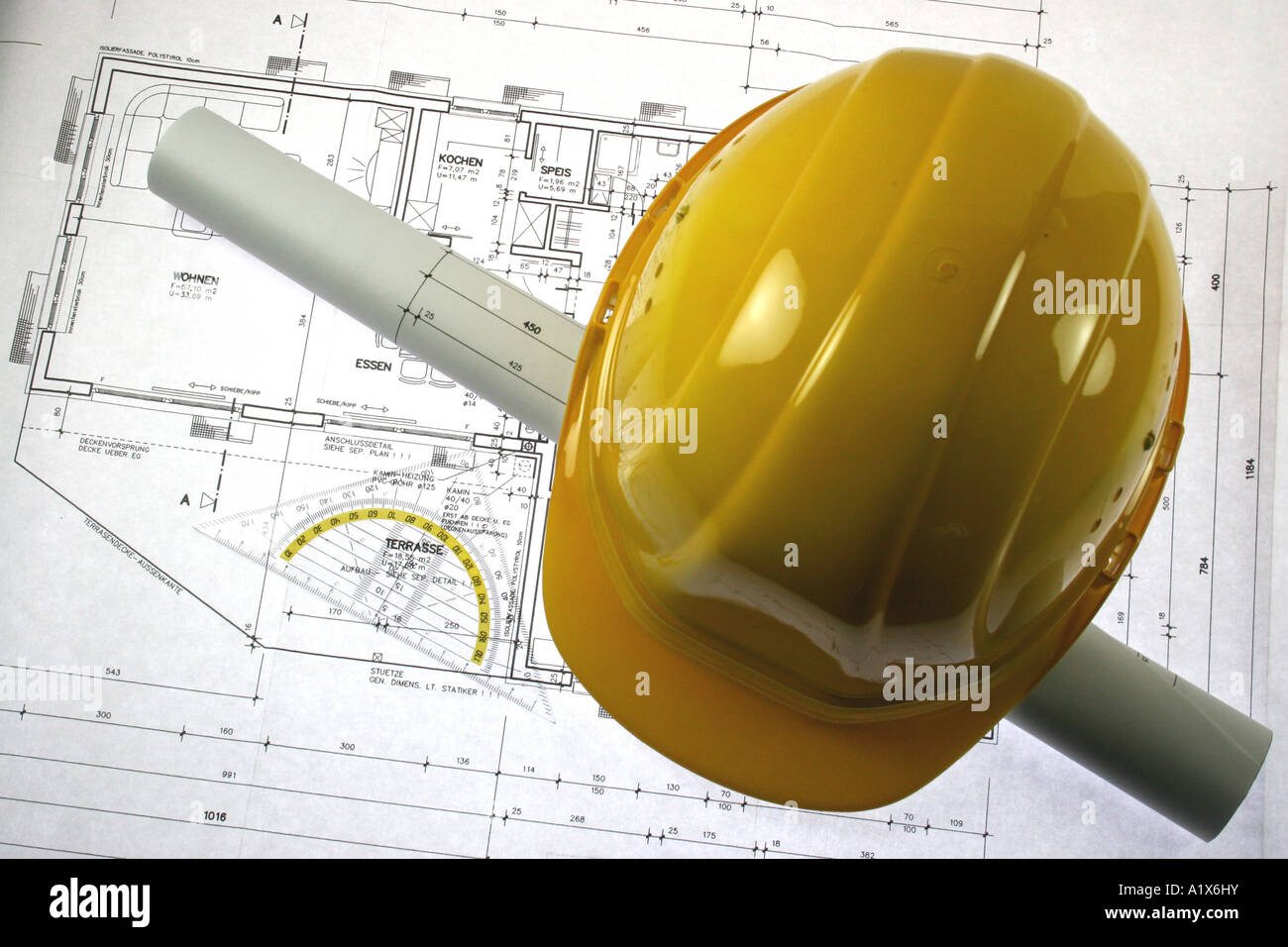 construction plan and a helmet Stock Photo - Alamy