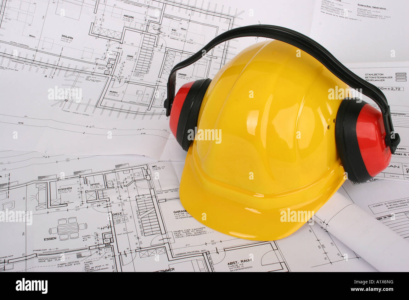 construction plan and a helmet Stock Photo - Alamy