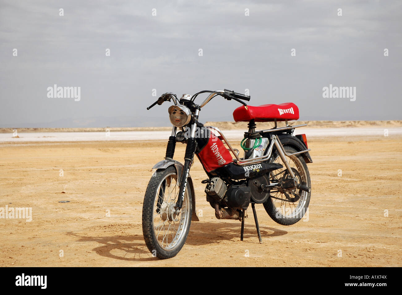 Peugeot scooter on Sahara desert in Tunisia Stock Photo - Alamy