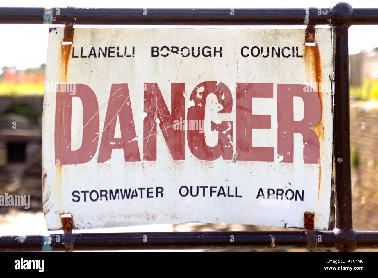old rusty " danger " sign Stock Photo - Alamy