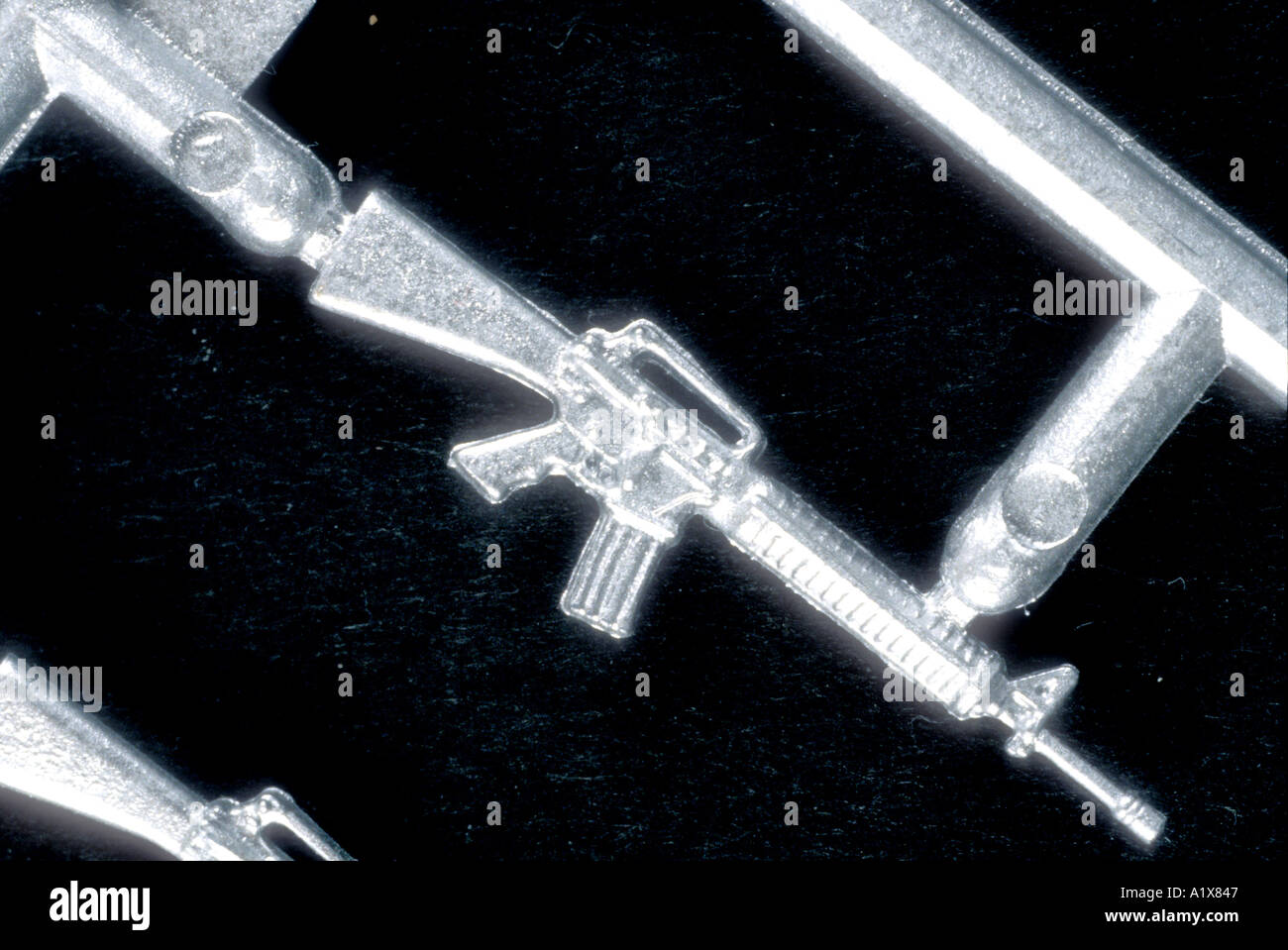 Toy machine gun on airfix kit Stock Photo - Alamy