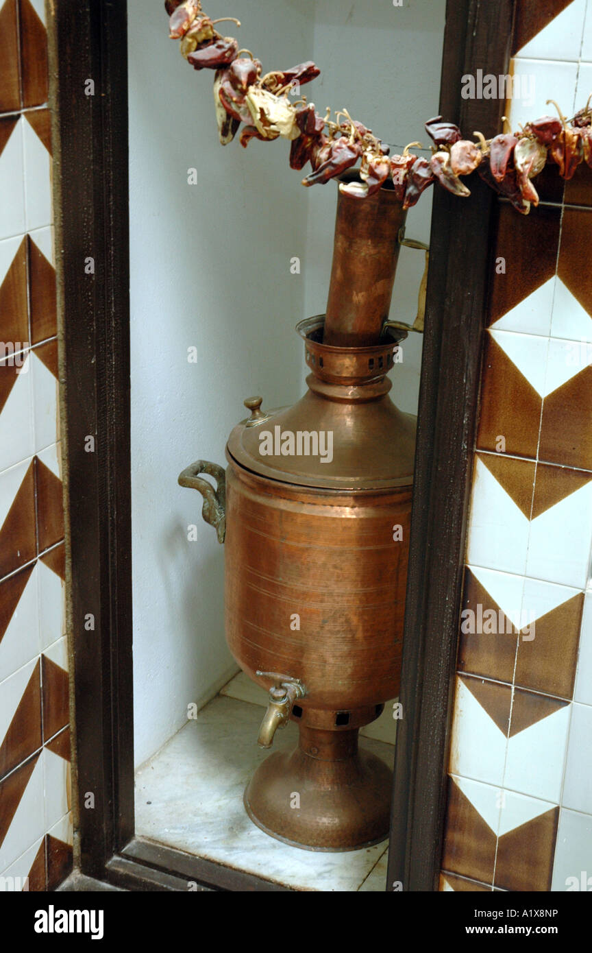 Samovar in typical old fashioned tunisian kitchen in Dar Cherait Museum ...