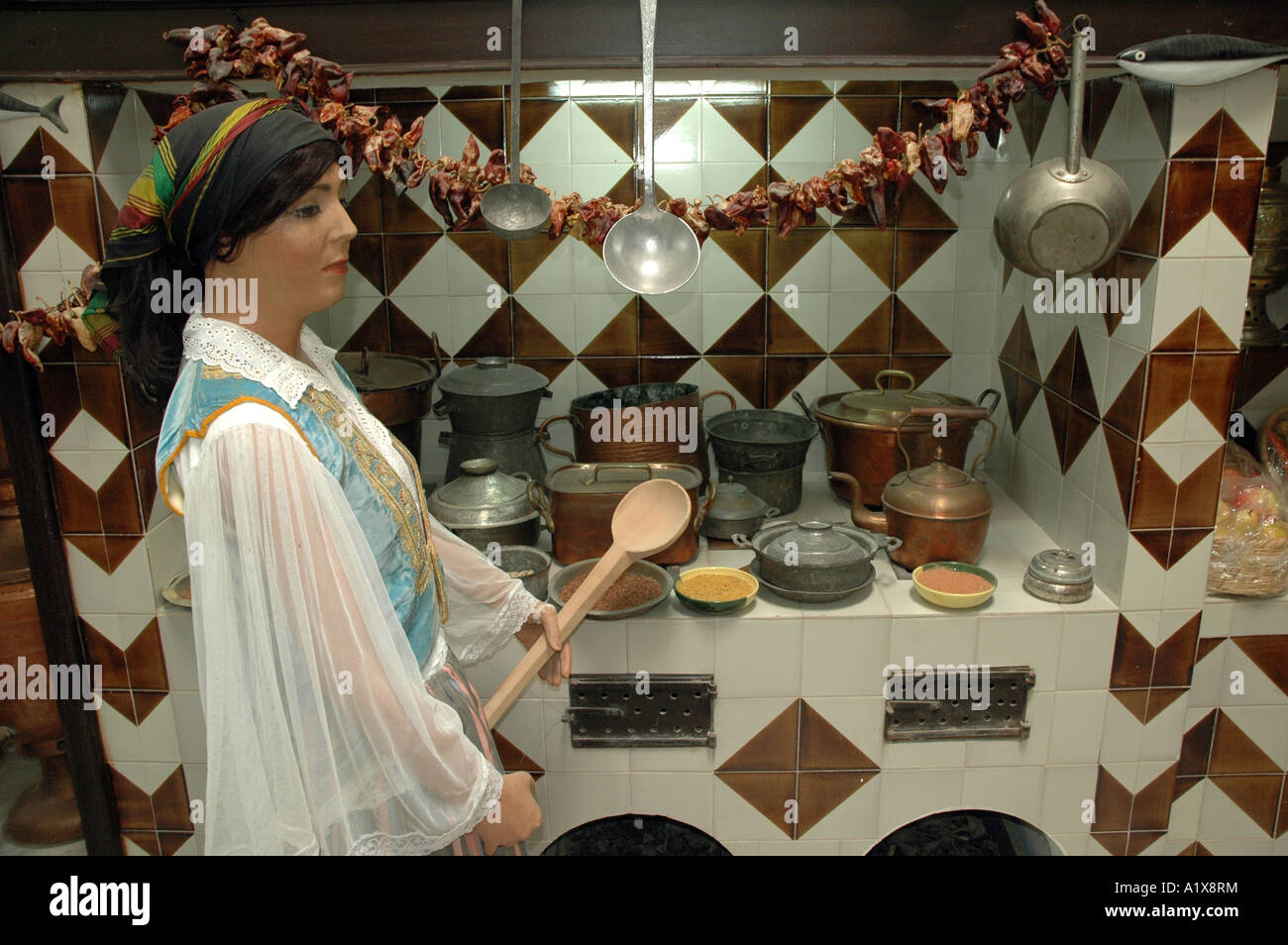 Typical old fashioned tunisian kitchen in Dar Cherait Museum in Tozeur ...