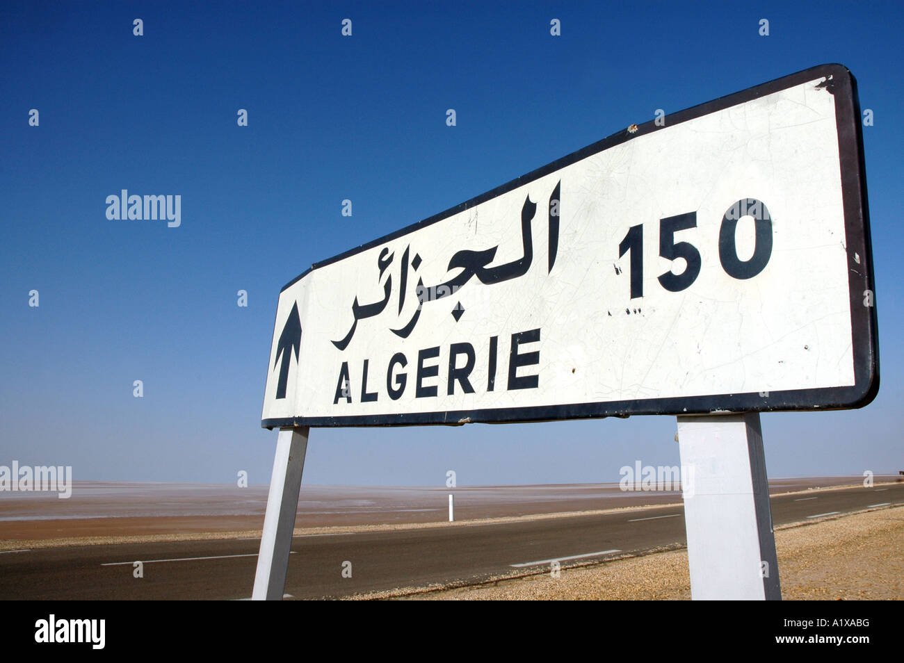 Sign informed about distance to Algeria border on the roadside of ...