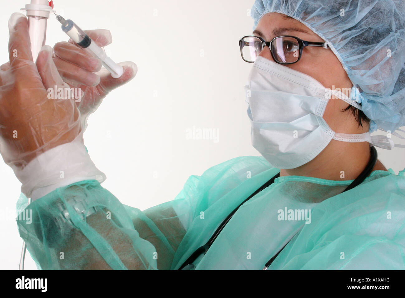surgeon with an injection Stock Photo - Alamy