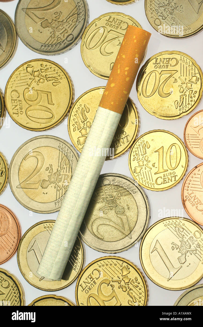 cigarette and coins Stock Photo - Alamy