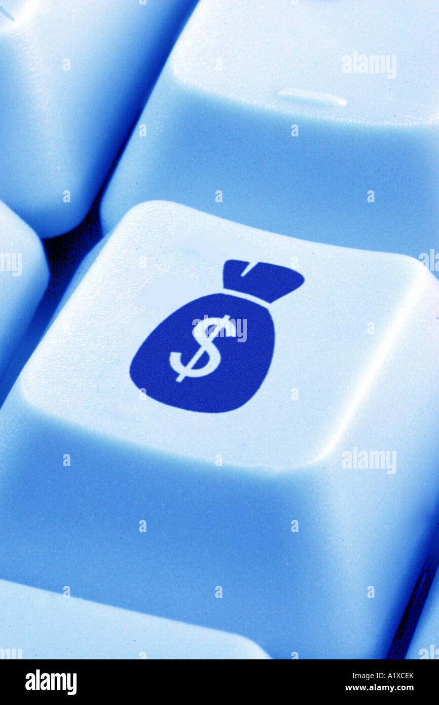 key with a bag of money Stock Photo - Alamy