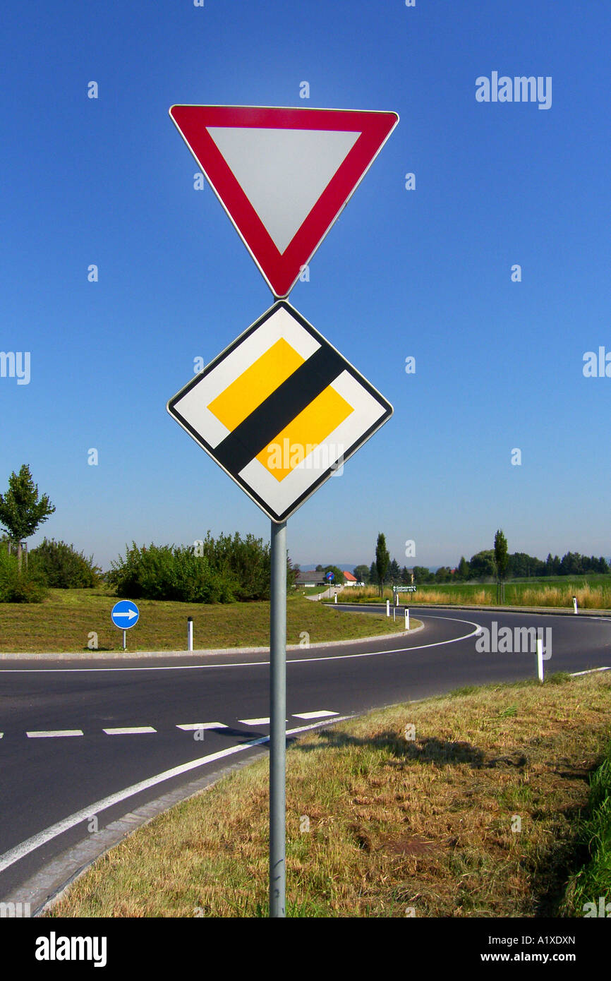 Yield roundabout traffic signs hi-res stock photography and images - Alamy