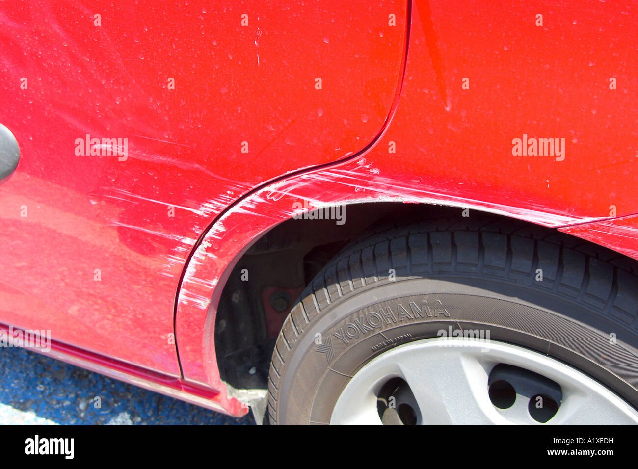 score on a red car Stock Photo - Alamy