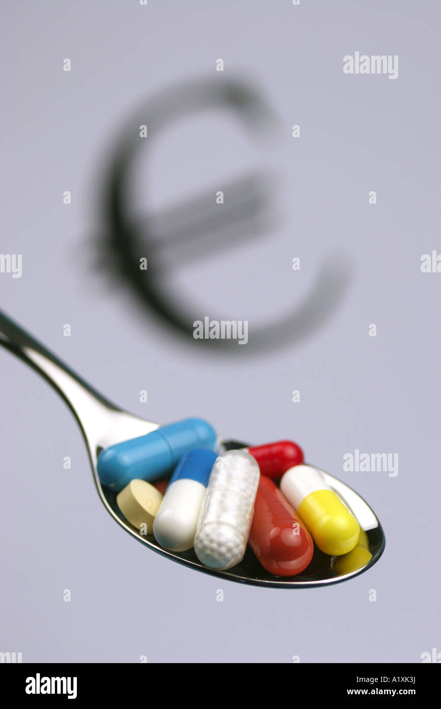 tablets on a spoon Stock Photo - Alamy