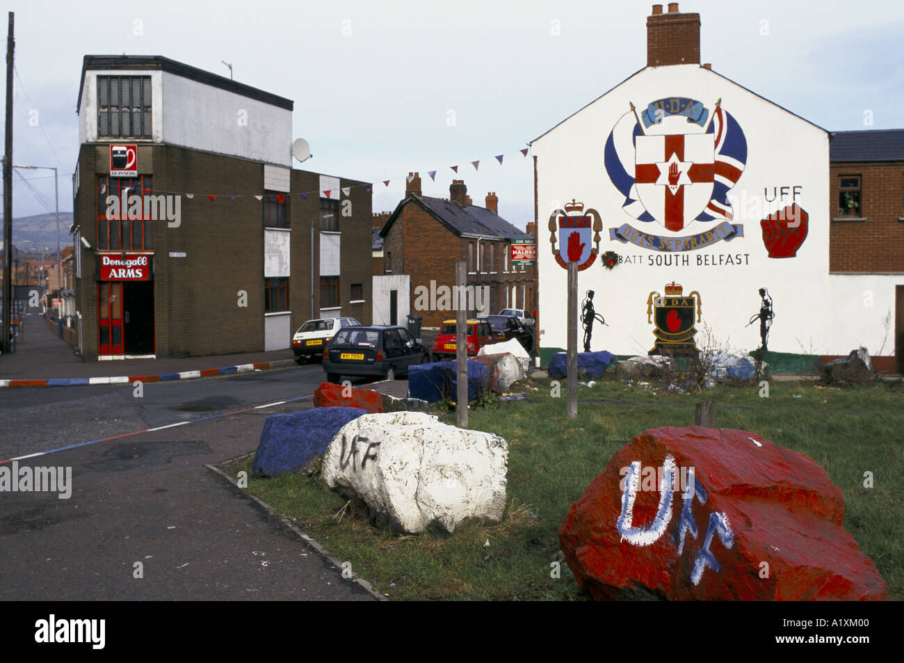 A STREET CORNER IN BELFAST HAS A PUB ON ONE SIDE THE DONEGAL ARMS AND A ...