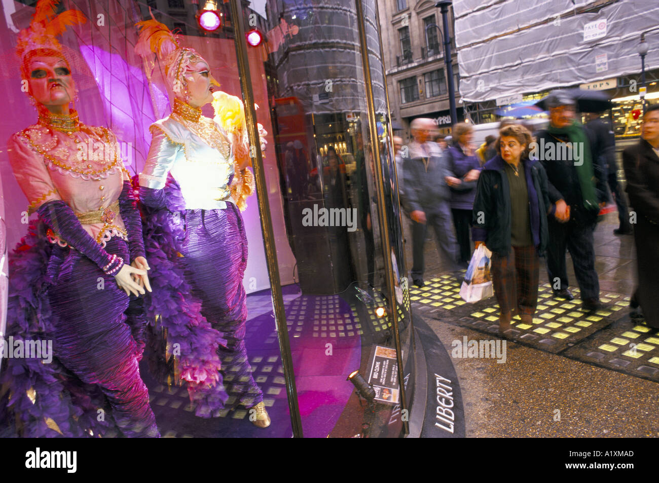 SHOPPERS LOOKING INTO LIBERTY S CHRISTMAS WINDOW DISPLAY LONDON Stock ...