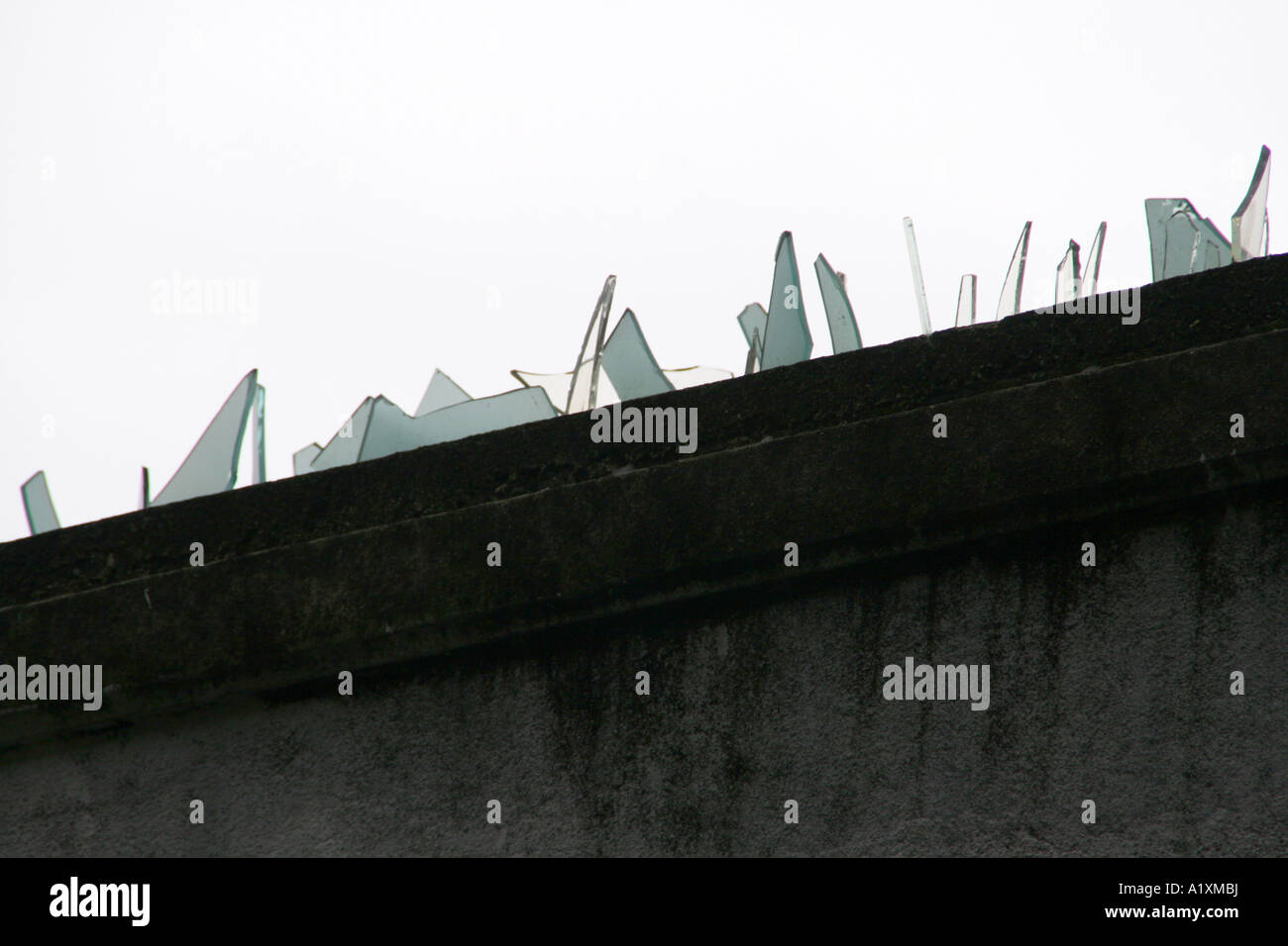 wall with glass fragments Stock Photo - Alamy