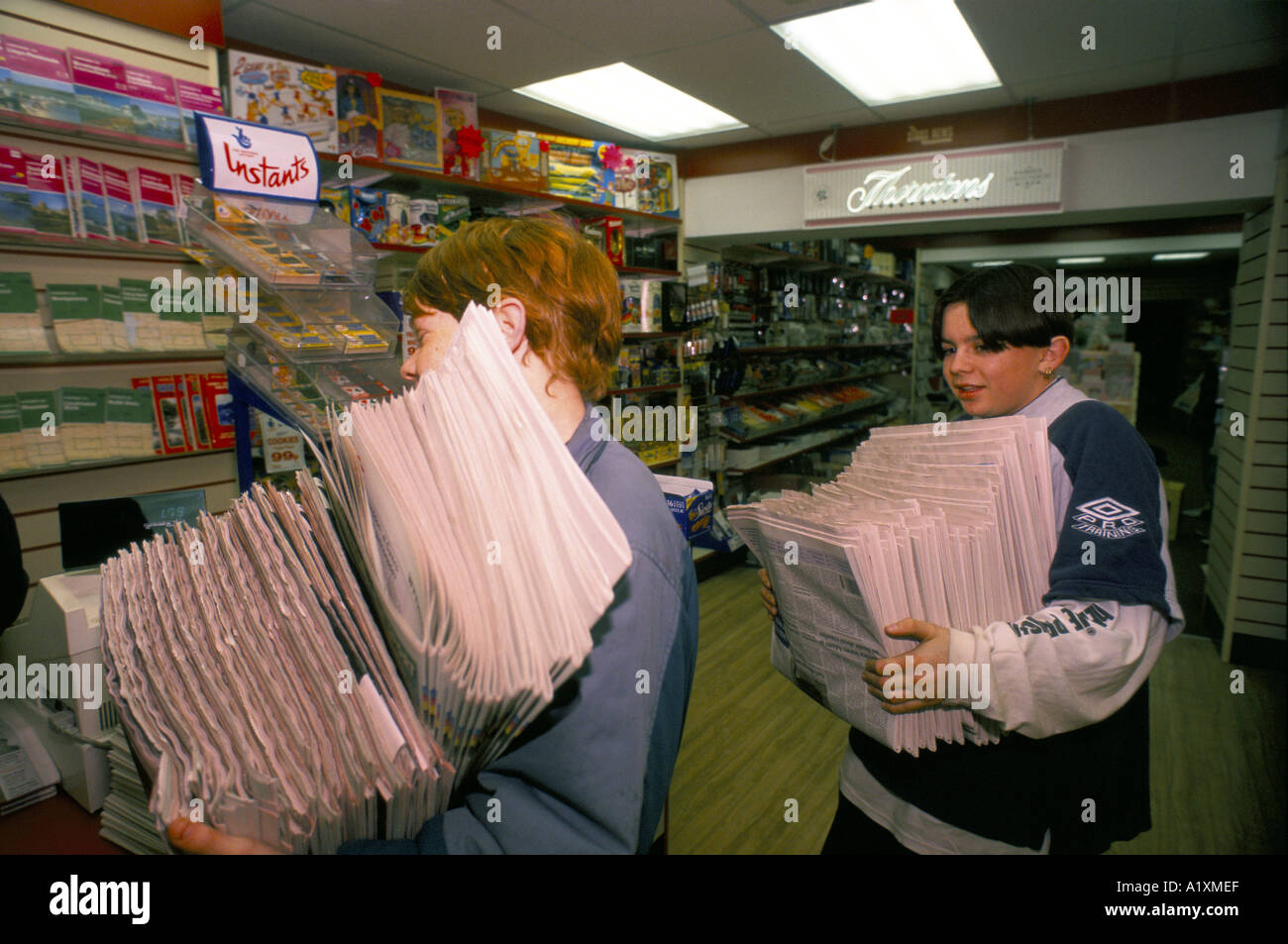 Newspaper delivery boys hi-res stock photography and images - Alamy