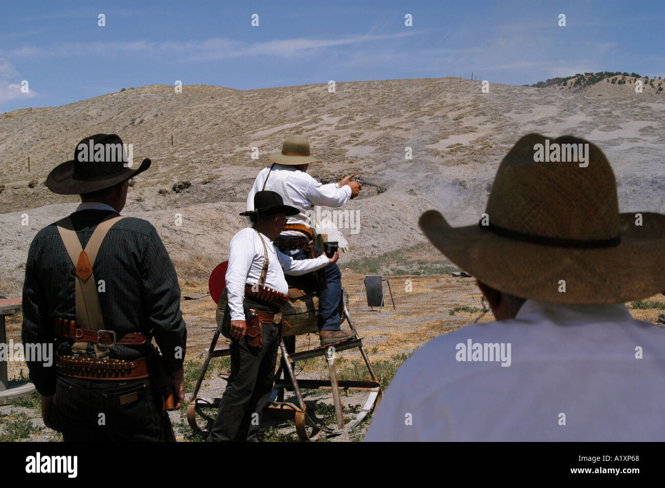Members of Colorado gun club the Comanche Valley Vigilantes take aim ...