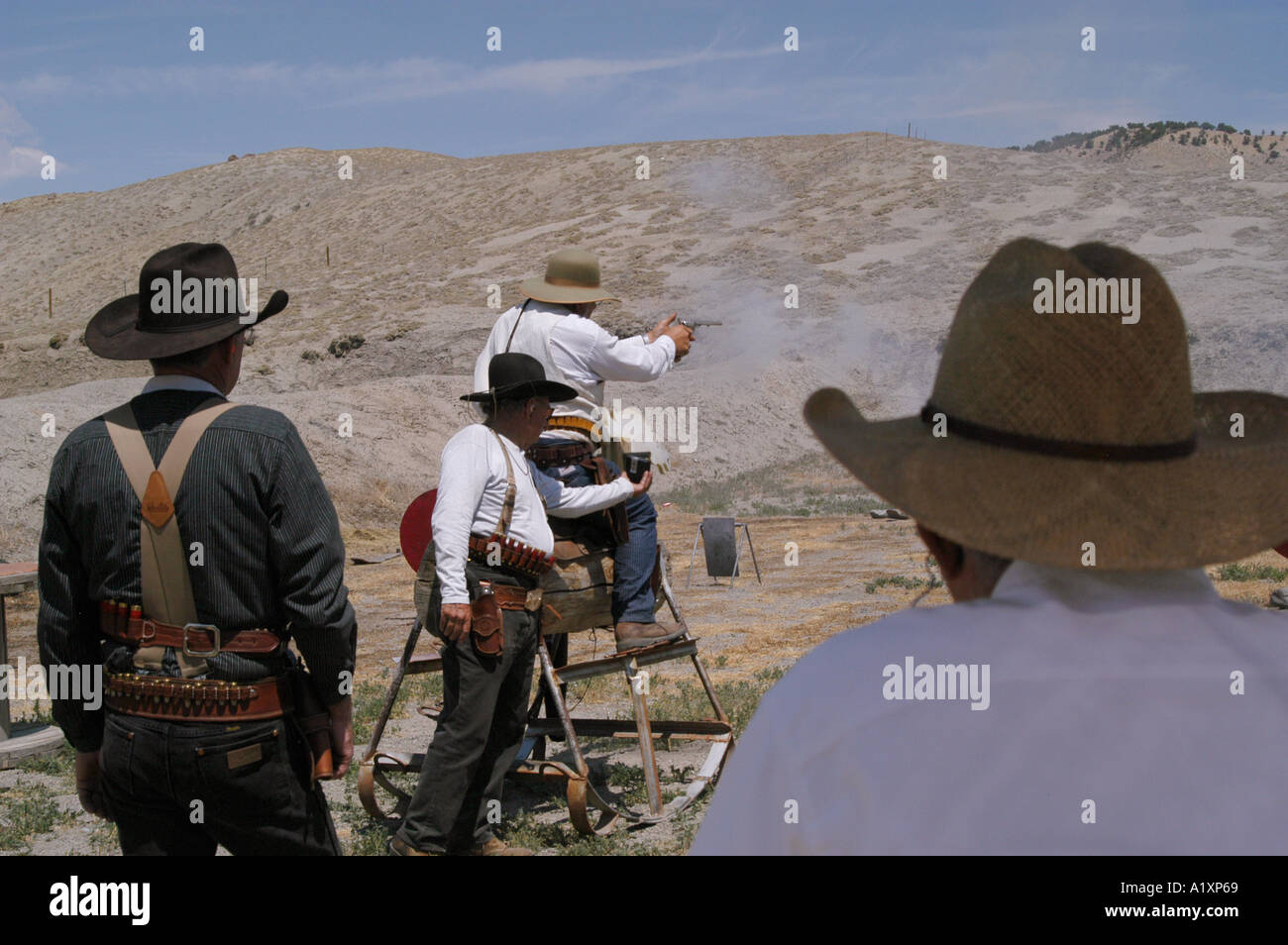 Members of Colorado gun club the Comanche Valley Vigilantes take aim ...