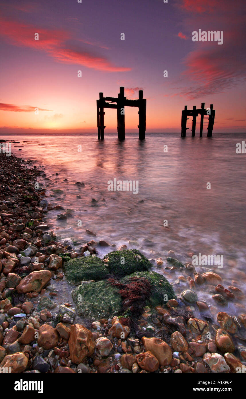 The remains of a D-Day pier, known as the Dolphins, stand in the Solent ...