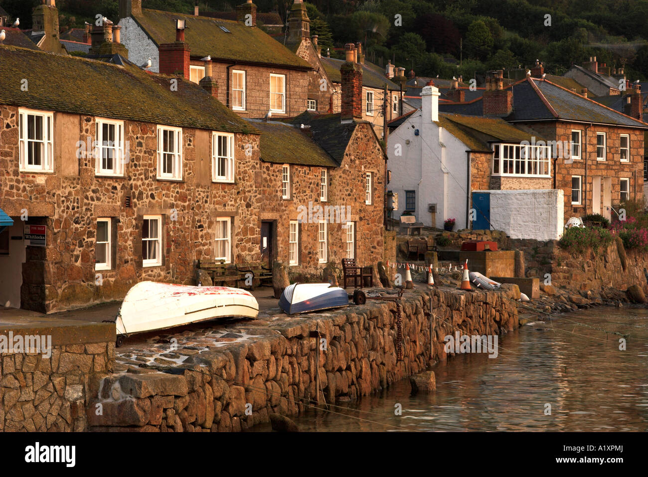 Mousehole harbour in the golden morning sun Stock Photo - Alamy
