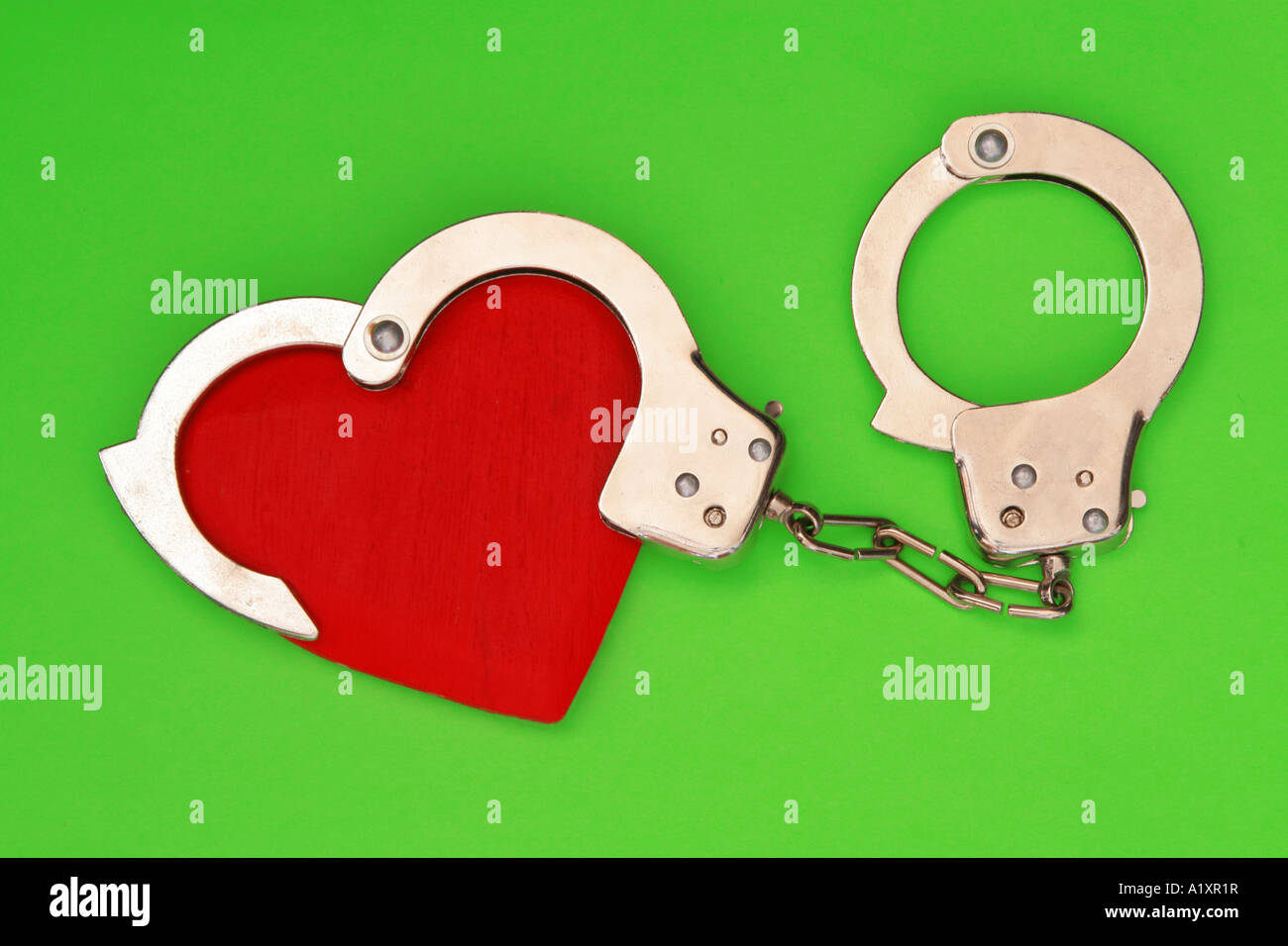 Heart illustration handcuffs hi-res stock photography and images - Alamy