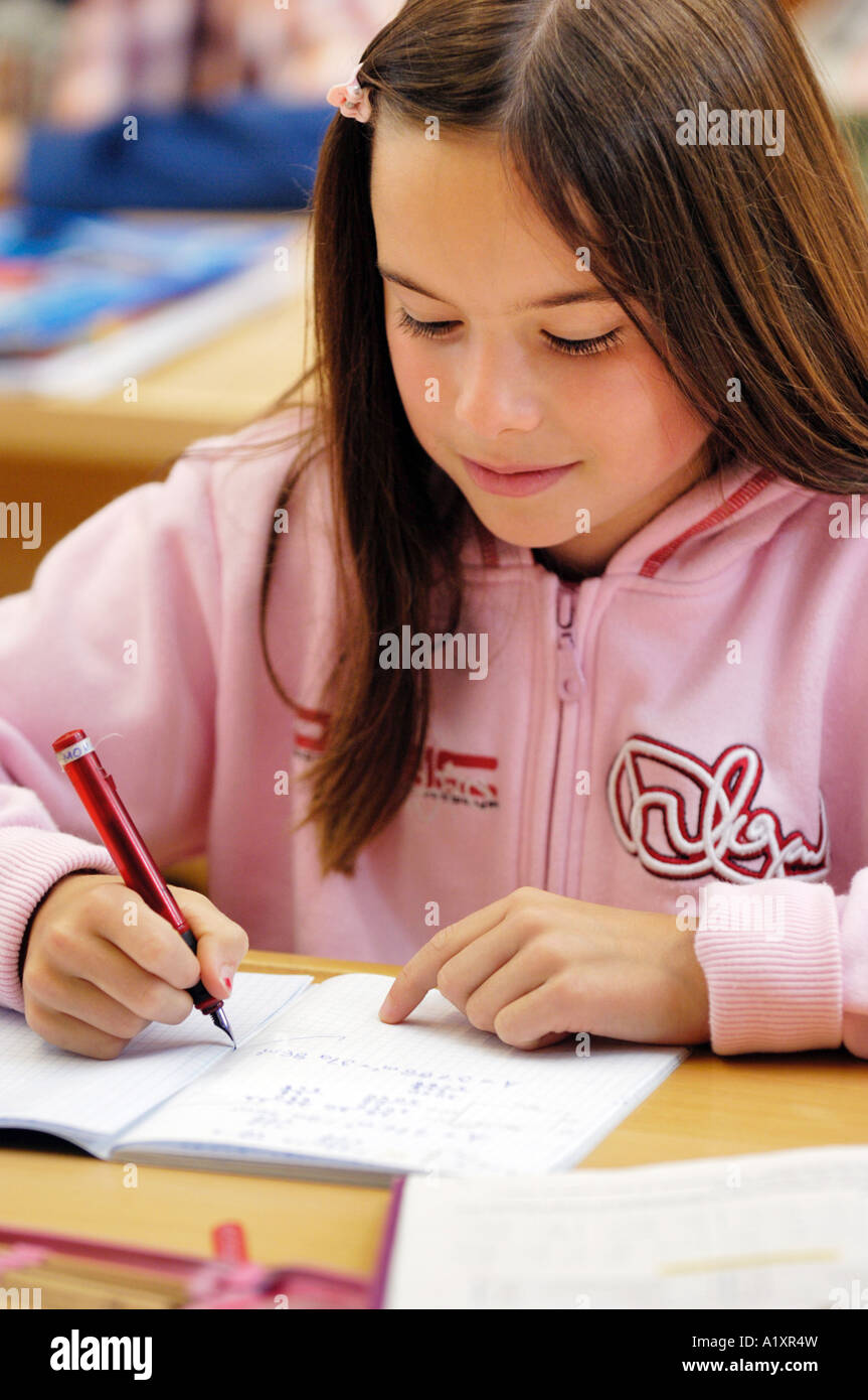 girl is writing Stock Photo - Alamy