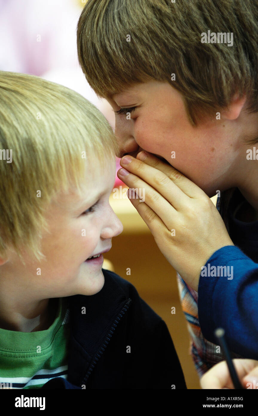 boys are whispering Stock Photo - Alamy