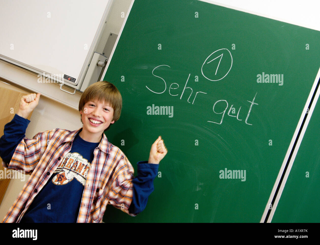 boy at the blackboard Stock Photo - Alamy