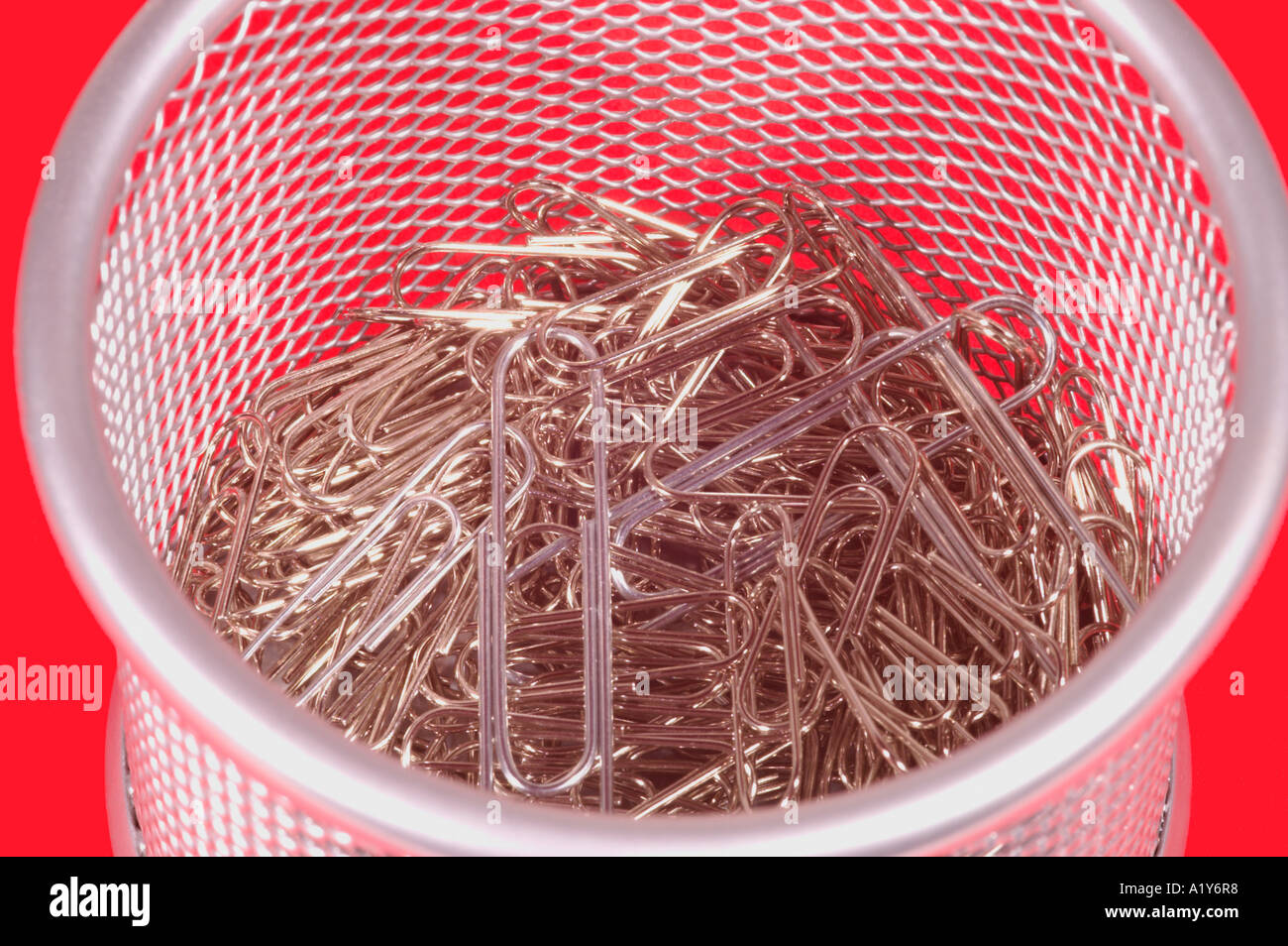 Paper clips in container Stock Photo - Alamy