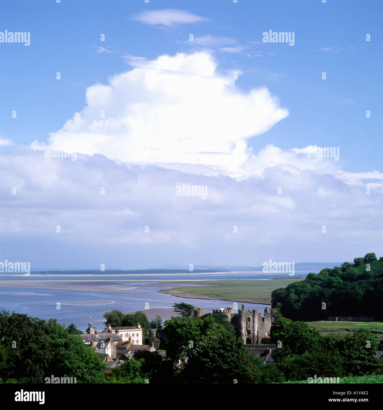 A view of Laugharne Castle, Castle House in village of Laugharne where ...