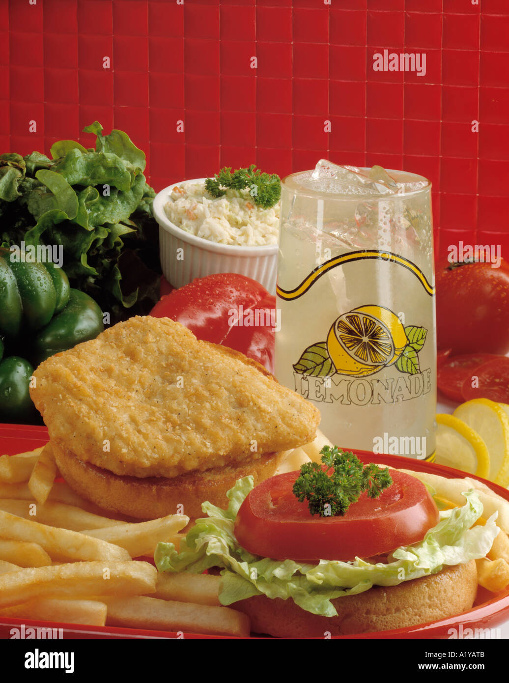 fried fish filet sandwich roll tomato tomatoe lettuce green peppers ...