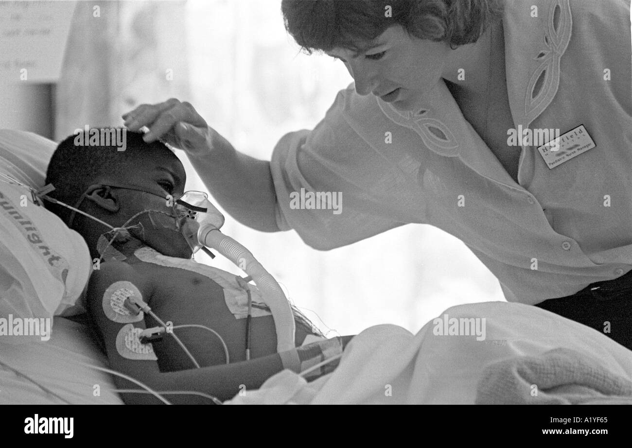 Nurse intensive care unit ethnic hi-res stock photography and images ...