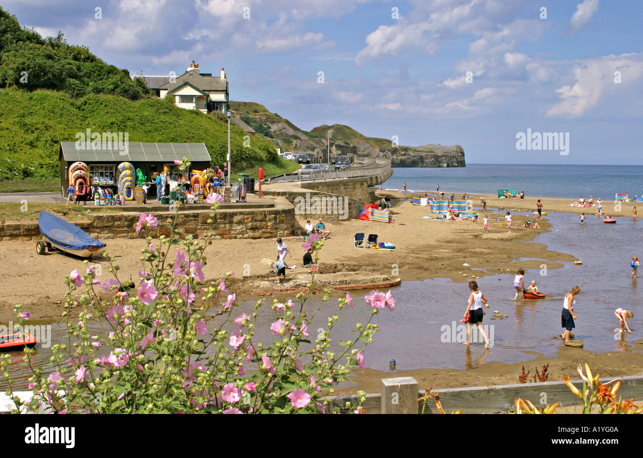 Sandsend North Yorkshire UK Paddling in stream on Beach Stock Photo - Alamy
