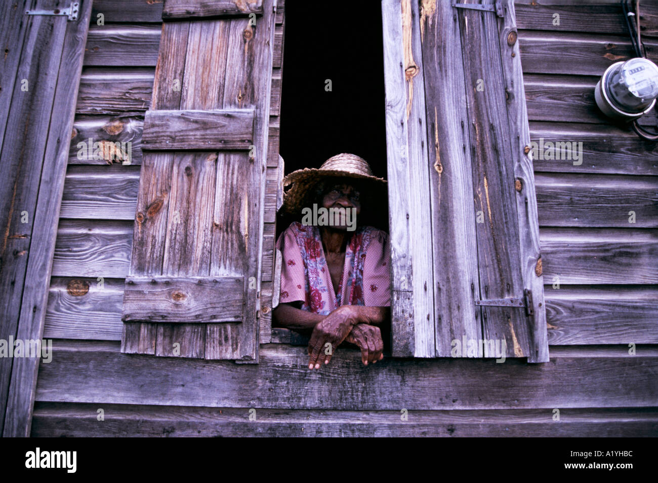 ST LUCIA CARIBBEAN 1996 OLD WOMAN AT THE WINDOW OF A SHACK 1996 Stock ...