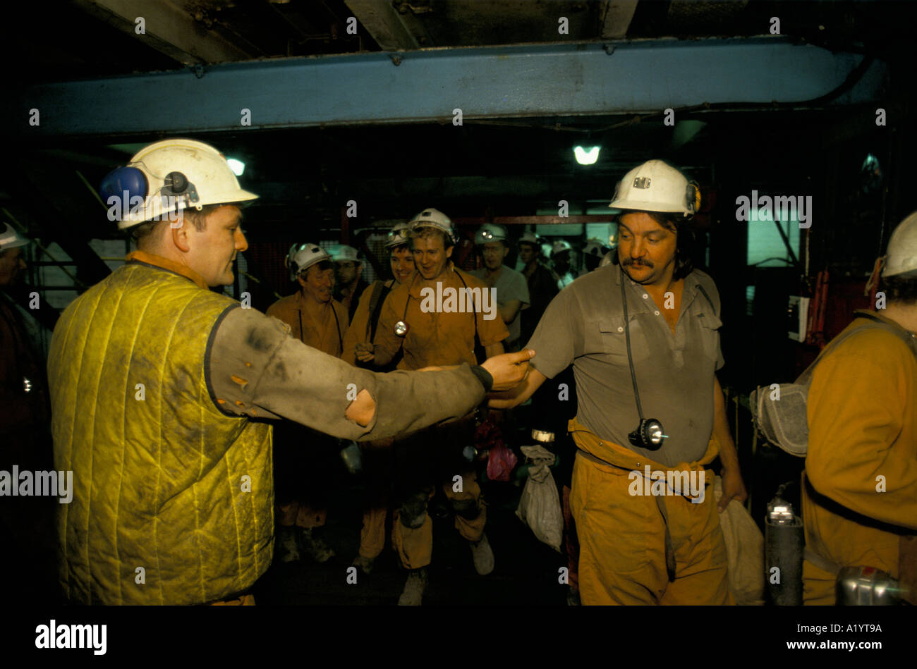 MINERS IN OVERALLS SAFETY HELMETS HEADTORCH AT COTGRAVE PIT ...
