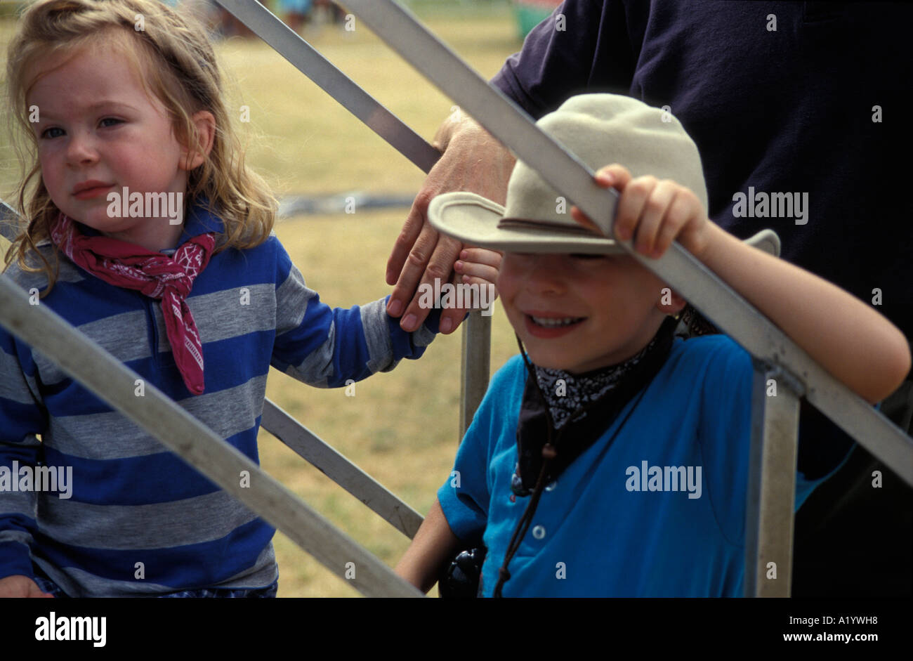 2 two children boy girl county country fair Stock Photo - Alamy