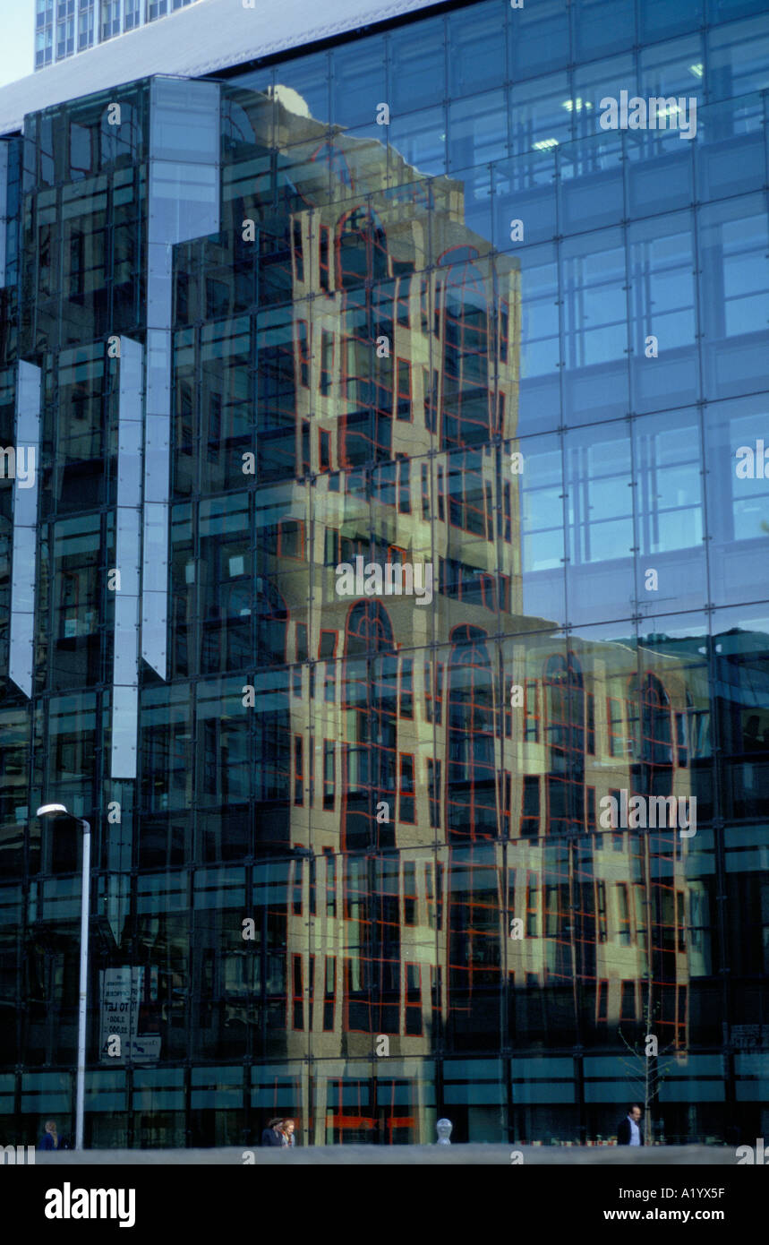 BUILDING REFLECTIONS ON WINDOWS OF A HIGH RISE OFFICE BLOCK CITY OF ...