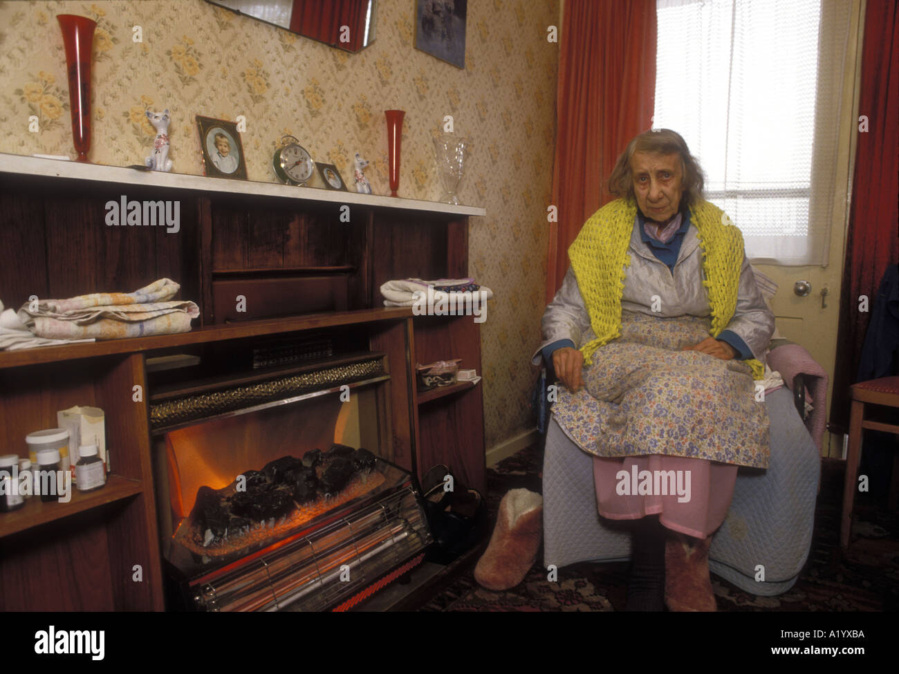 Old age pensioner electric fire hi-res stock photography and images - Alamy