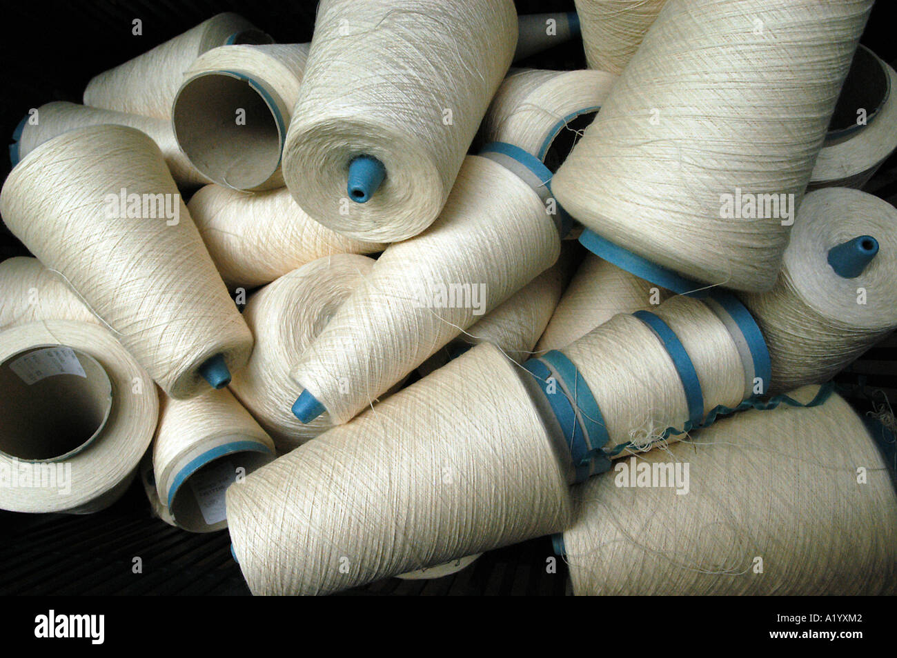 Reels of industrial thread Stock Photo - Alamy