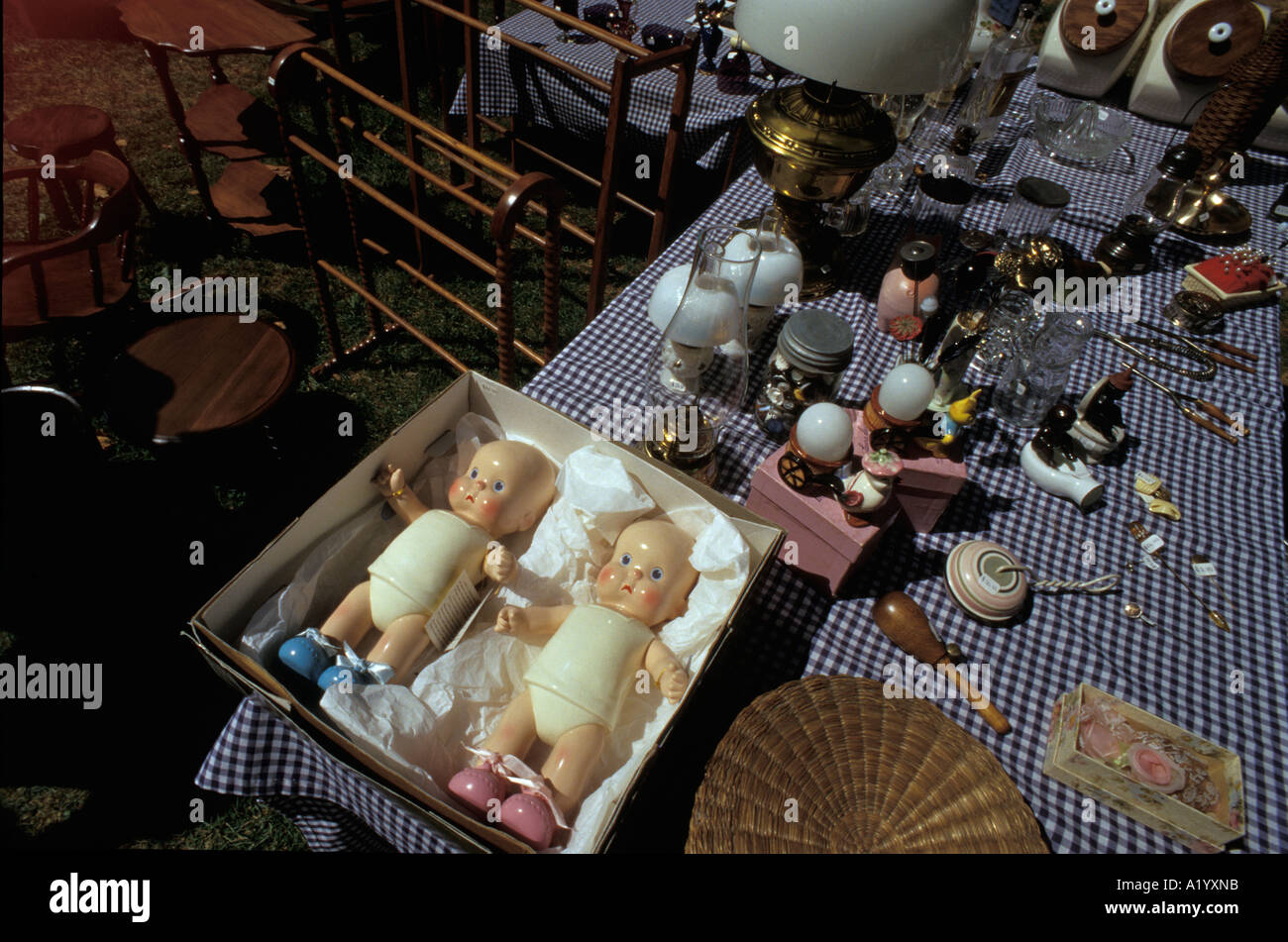 antique dealer table plastic dolls Stock Photo - Alamy