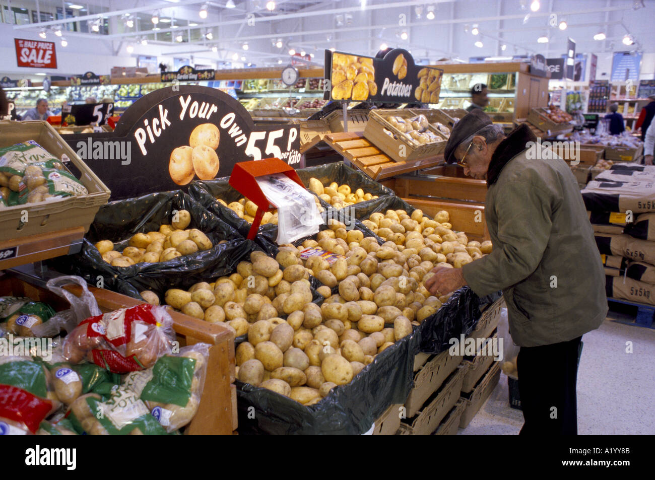 ASDA SUPERMARKET WEMBLEY OLDER MAN CHOOSING POTATOES 1999 1999 Stock ...