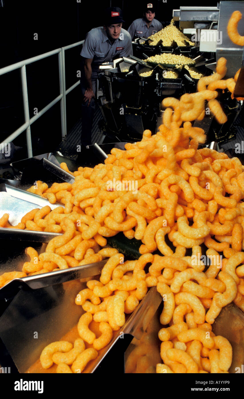 assembly line snack food corn curls Stock Photo - Alamy