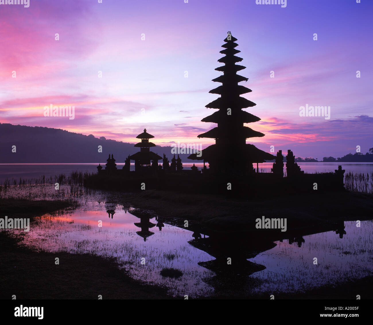 Reflections of the Candikuning Temple in the water of Lake Bratan on ...